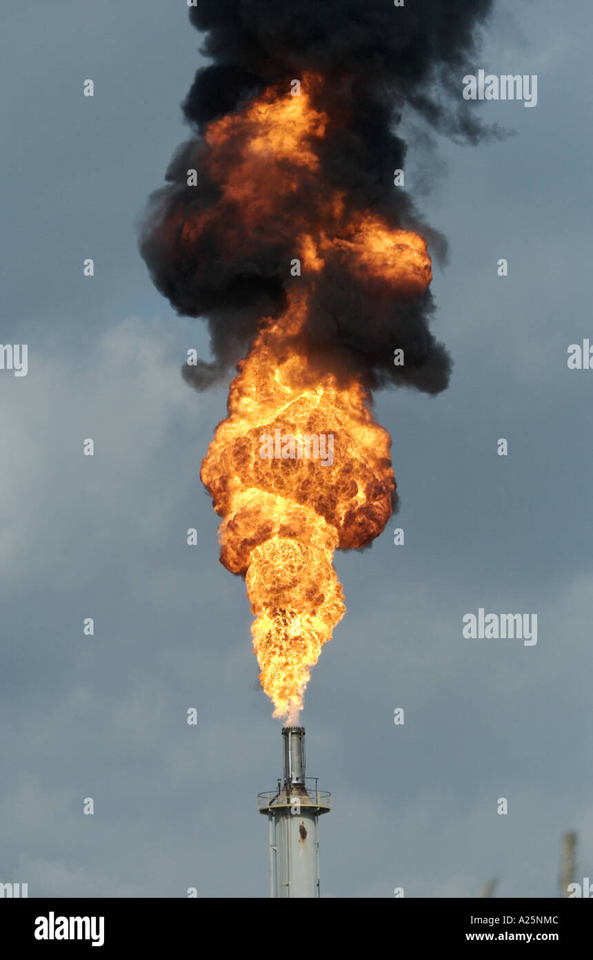 Intense hot fires burning from oil refinery flares Stock Photo - Alamy