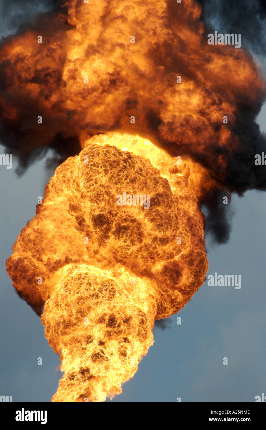 Intense hot fires burning from oil refinery flares Stock Photo - Alamy