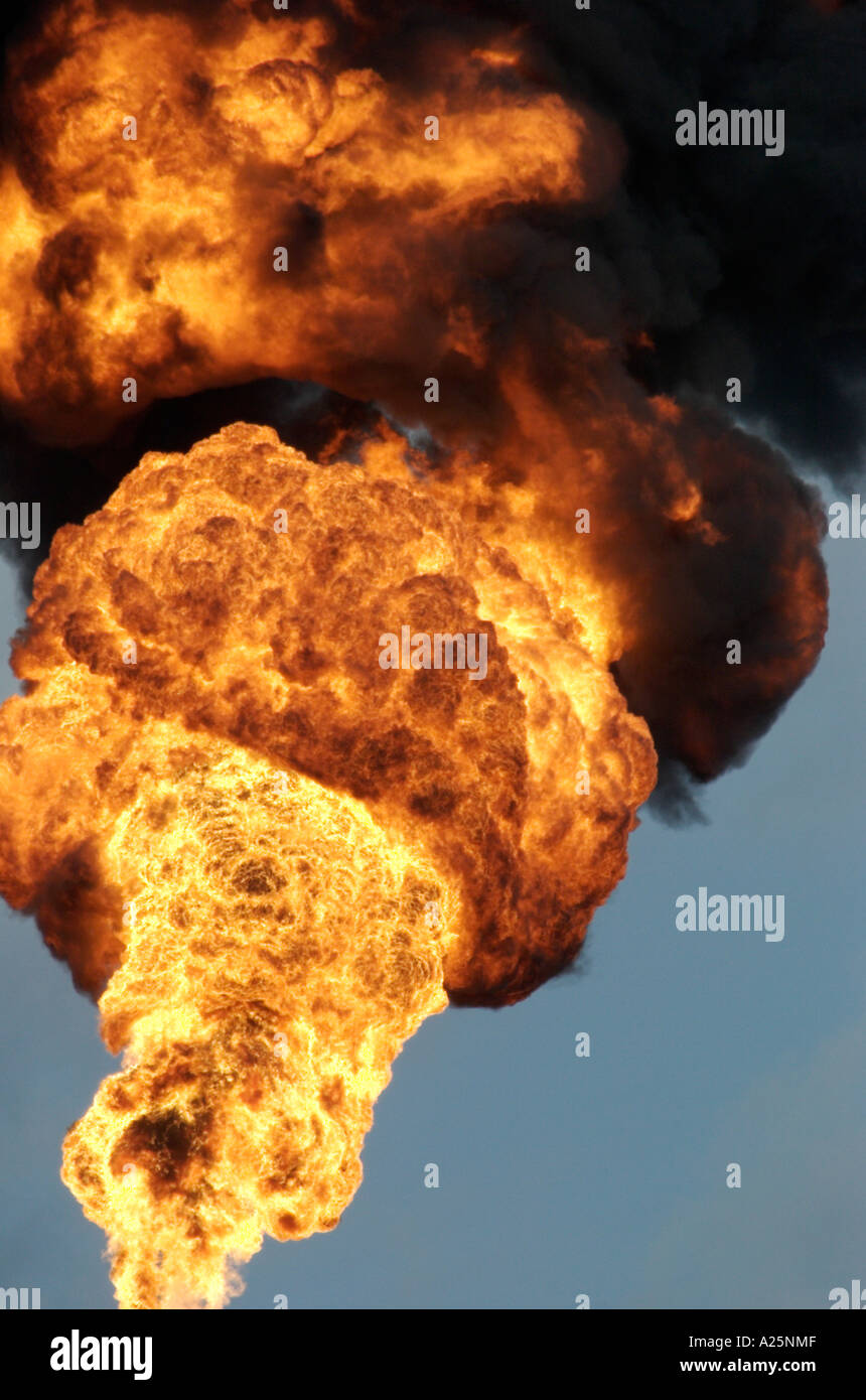 Intense hot fires burning from oil refinery flares Stock Photo - Alamy