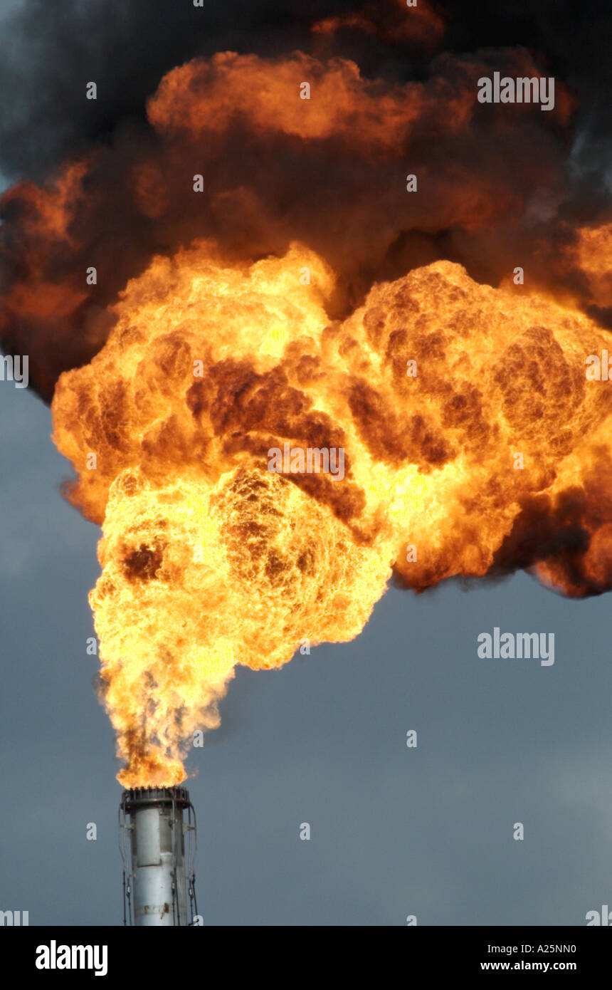 Intense hot fires burning from oil refinery flares Stock Photo - Alamy