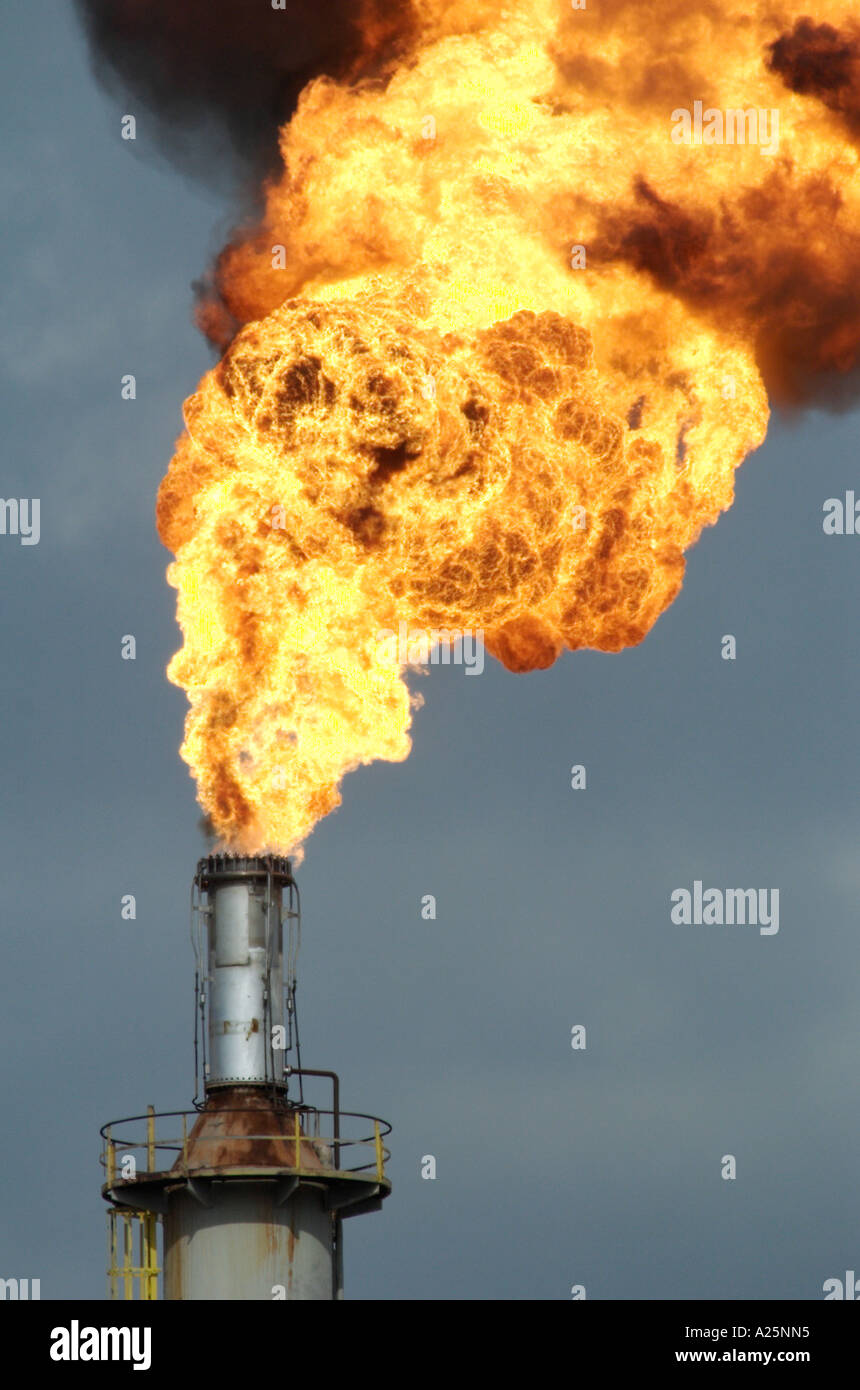 Intense hot fires burning from oil refinery flares Stock Photo - Alamy