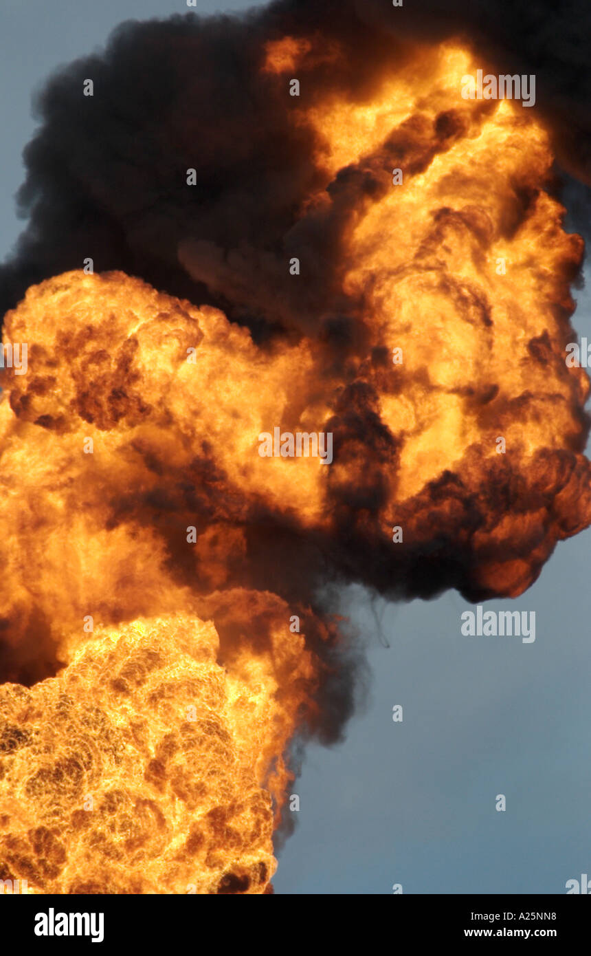 Intense hot fires burning from oil refinery flares Stock Photo - Alamy
