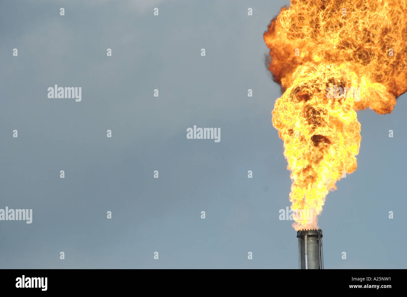 Intense hot fires burning from oil refinery flares Stock Photo - Alamy