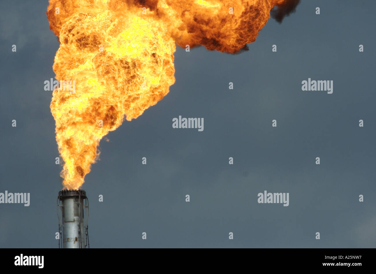Intense hot fires burning from oil refinery flares Stock Photo - Alamy