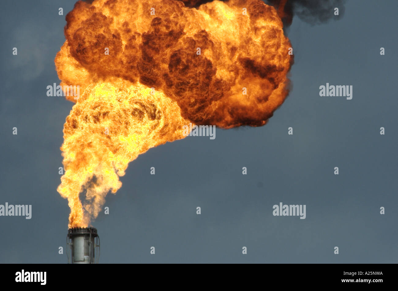 Intense hot fires burning from oil refinery flares Stock Photo - Alamy