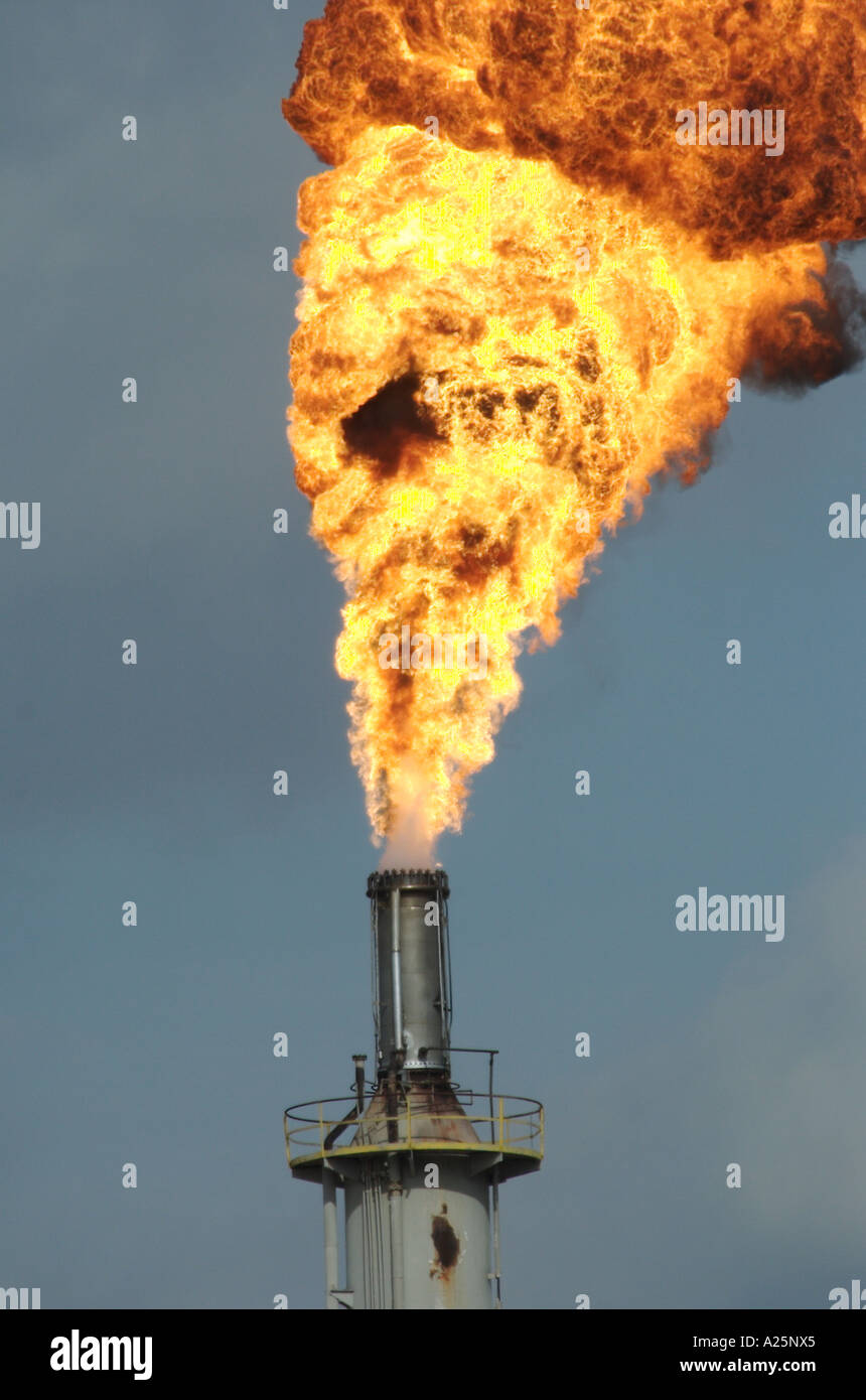 Intense hot fires burning from oil refinery flares Stock Photo - Alamy
