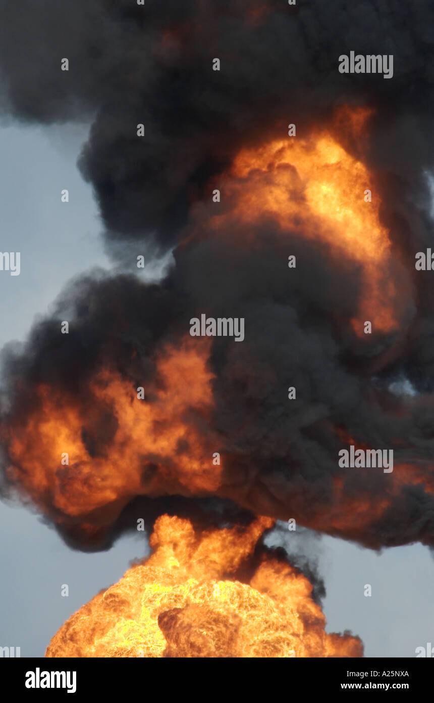 Intense hot fires burning from oil refinery flares Stock Photo - Alamy