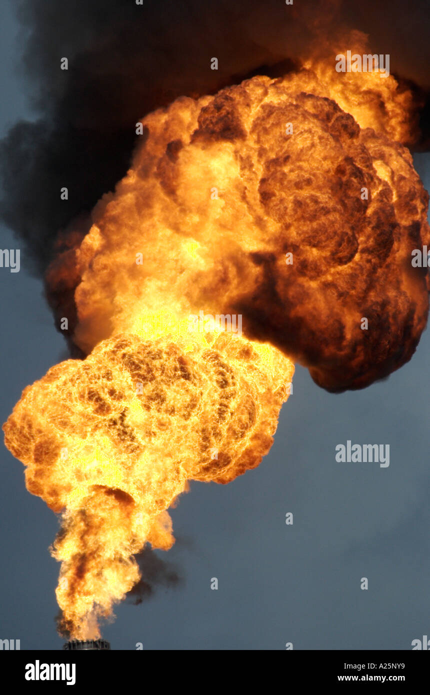 Intense hot fires burning from oil refinery flares Stock Photo - Alamy