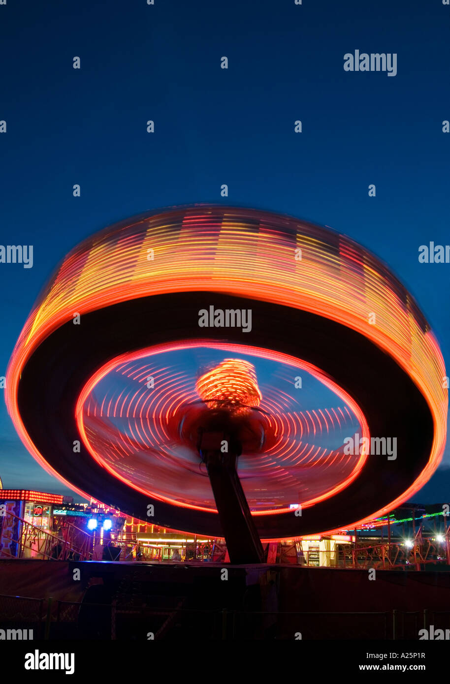 funfair ferris wheel ride spinning at night funfair ride london zoom ...