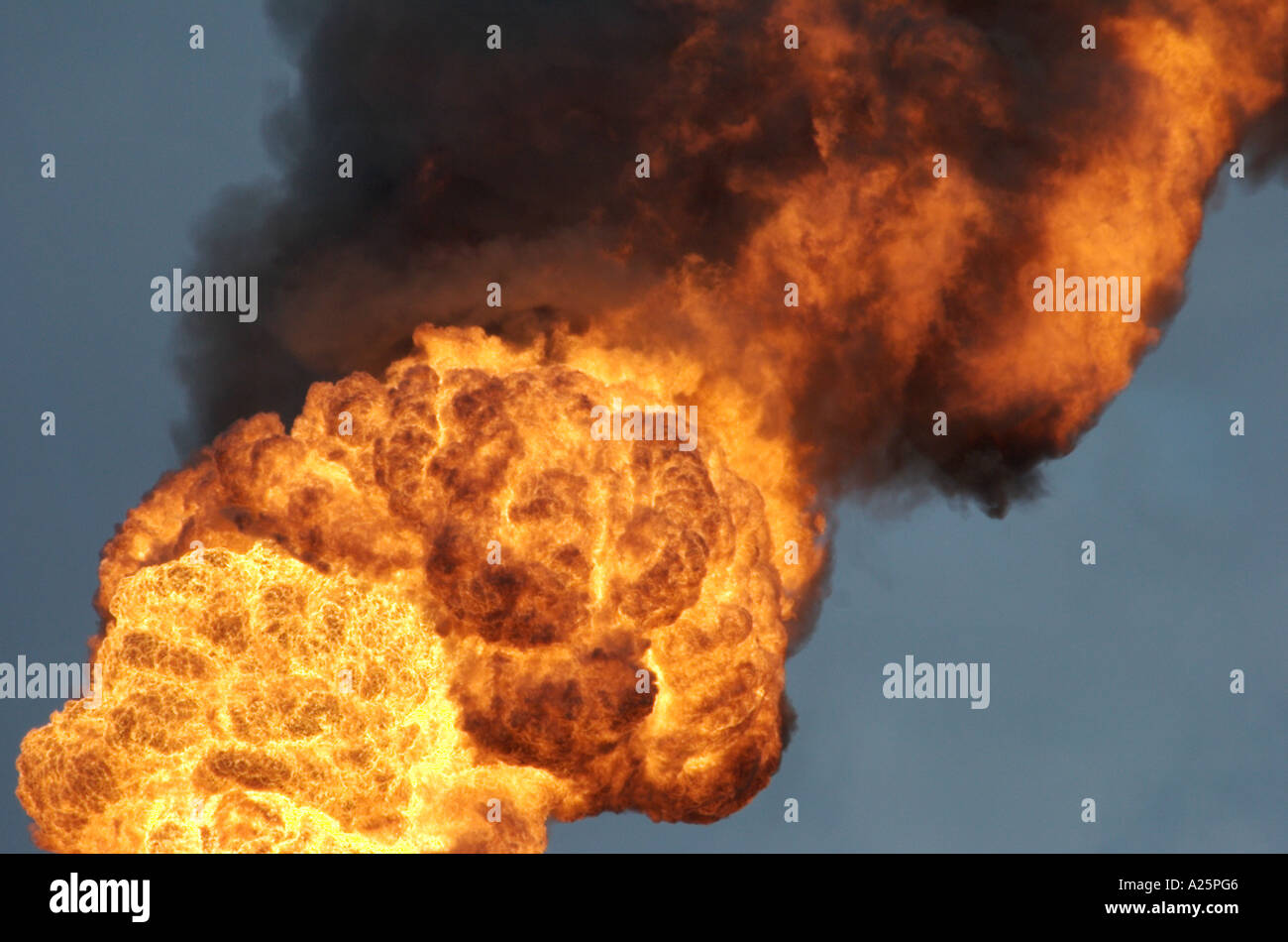 Intense hot fires burning from oil refinery flares Stock Photo - Alamy