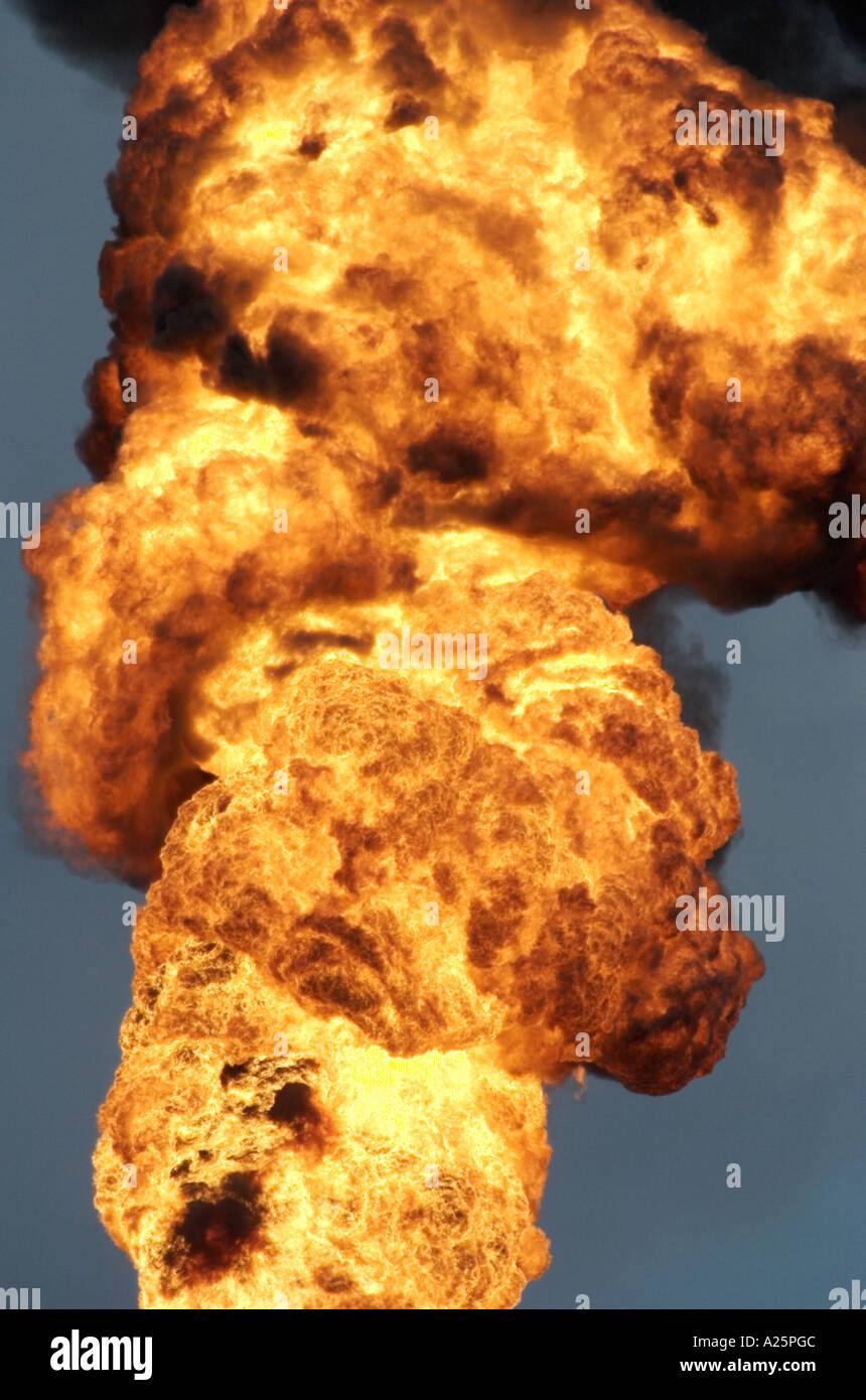 Intense hot fires burning from oil refinery flares Stock Photo - Alamy
