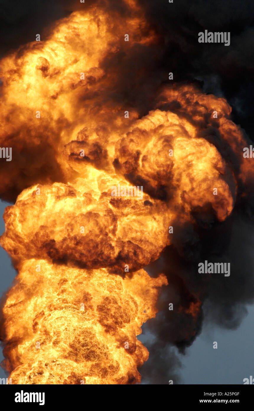 Intense hot fires burning from oil refinery flares Stock Photo - Alamy
