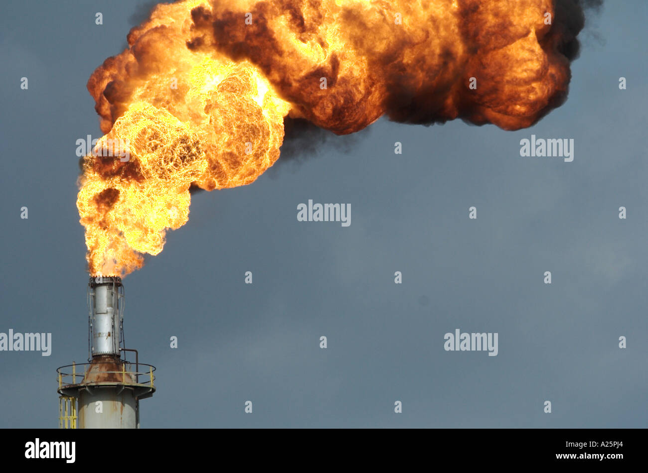 Intense hot fires burning from oil refinery flares Stock Photo - Alamy
