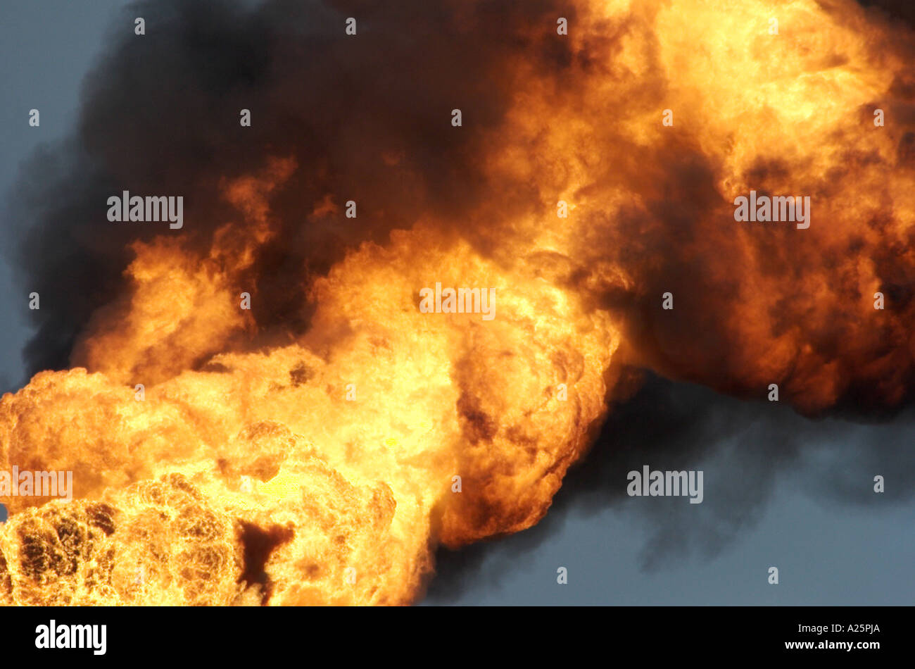 Intense hot fires burning from oil refinery flares Stock Photo - Alamy
