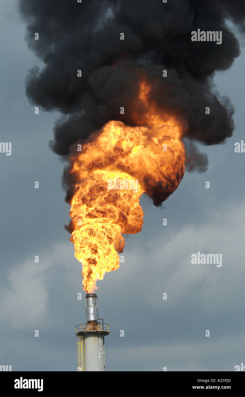 Intense hot fires burning from oil refinery flares Stock Photo - Alamy