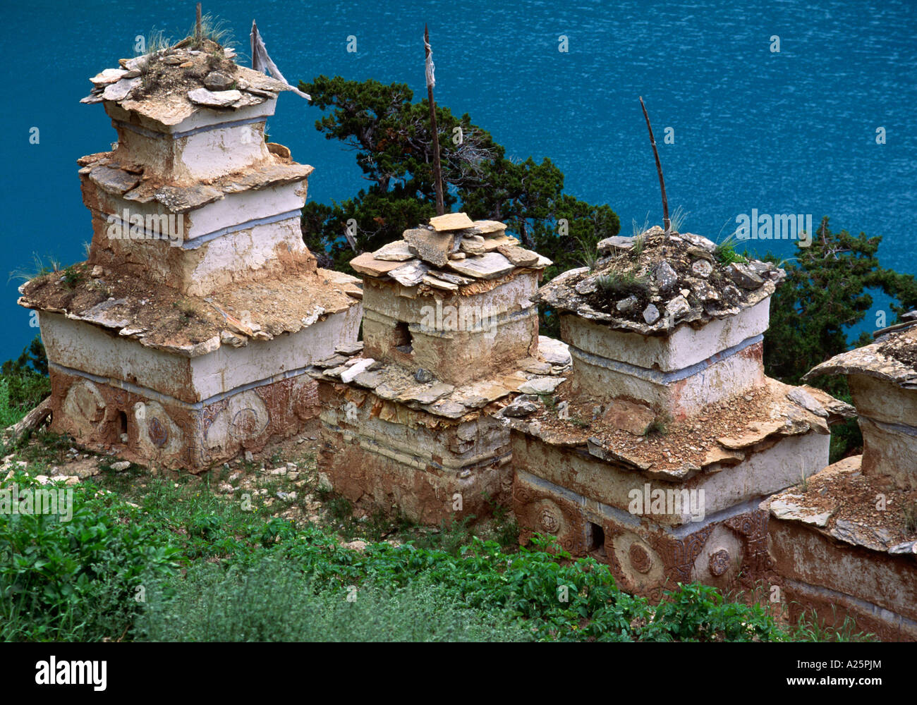 CHORTENS of the pre Buddhist BONPO religion above PHOKSUNDO LAKE near ...