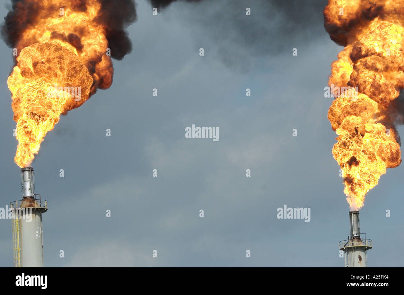 Intense hot fires burning from oil refinery flares Stock Photo - Alamy