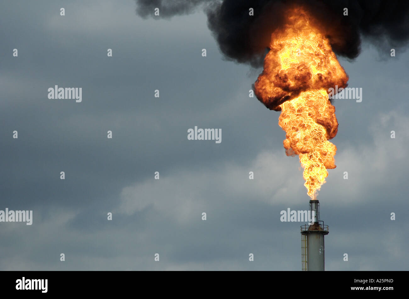 Intense hot fires burning from oil refinery flares Stock Photo - Alamy
