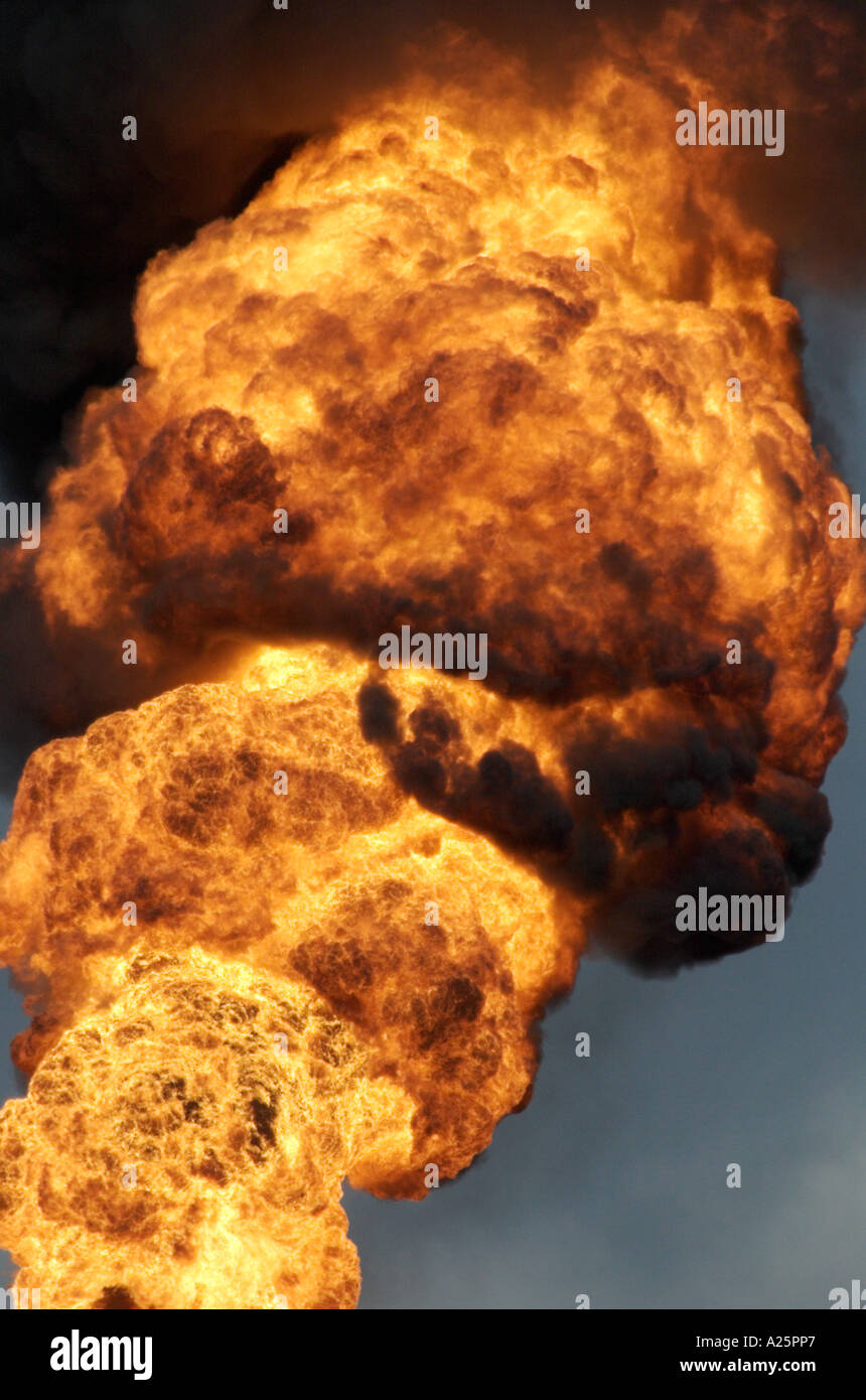 Intense hot fires burning from oil refinery flares Stock Photo - Alamy