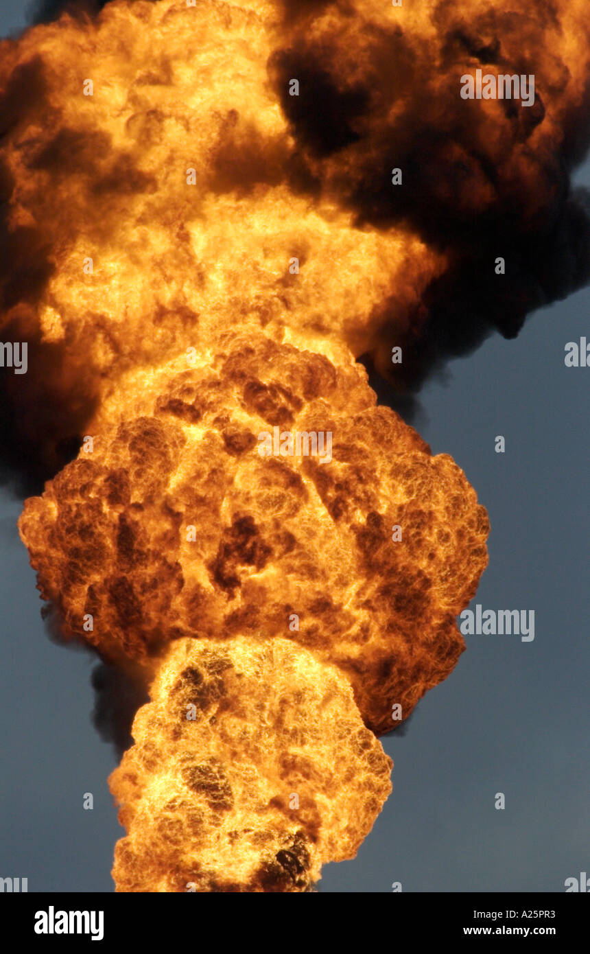 Intense hot fires burning from oil refinery flares Stock Photo - Alamy