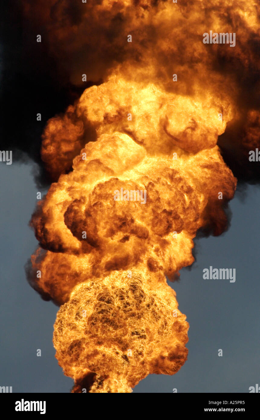 Intense hot fires burning from oil refinery flares Stock Photo - Alamy
