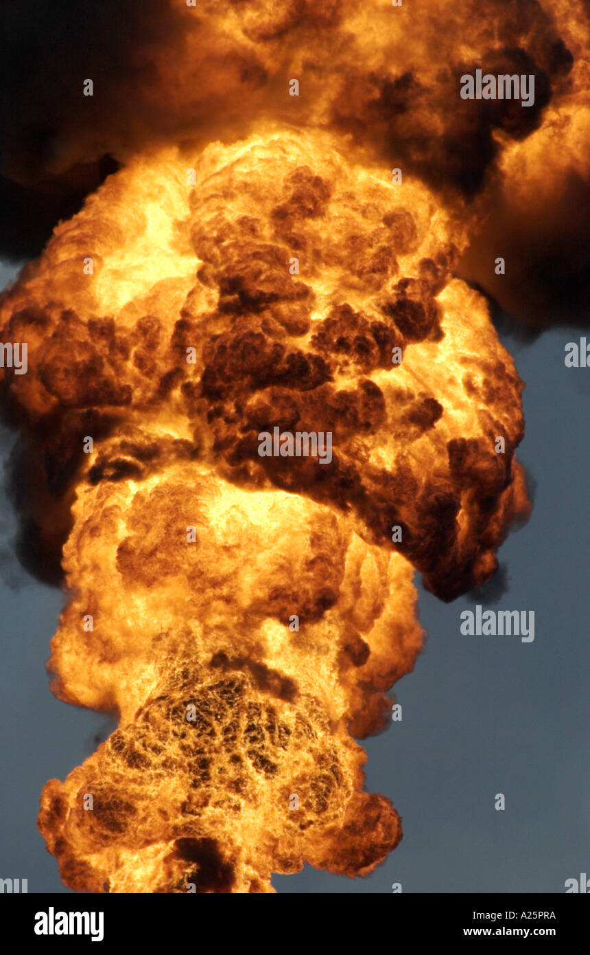 Intense hot fires burning from oil refinery flares Stock Photo - Alamy