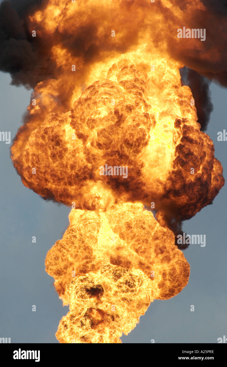 Intense hot fires burning from oil refinery flares Stock Photo - Alamy