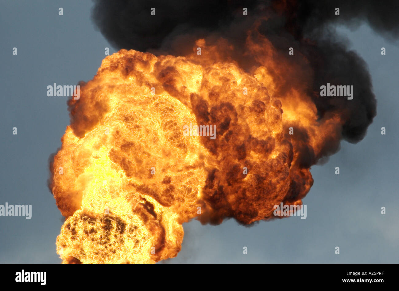 Intense hot fires burning from oil refinery flares Stock Photo - Alamy