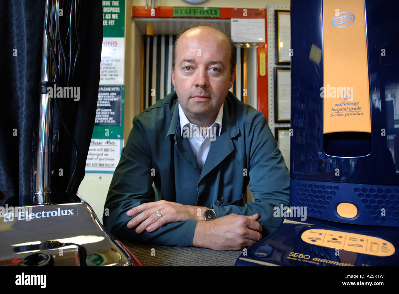 A VACUUM CLEANER SHOP OWNER UK Stock Photo - Alamy