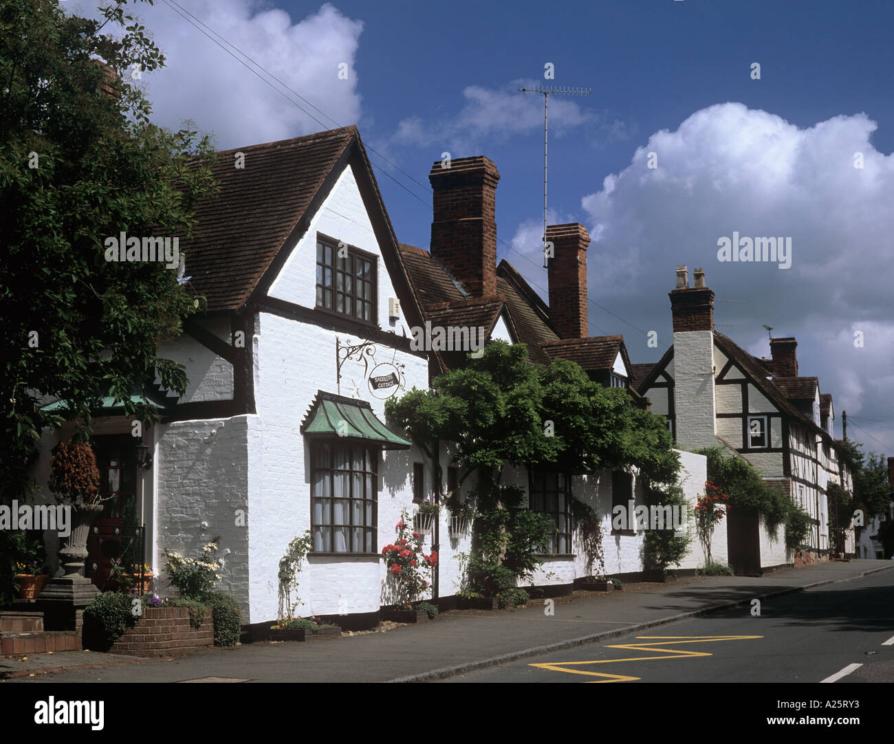 TIMBER FRAMED WHITE COTTAGES in the main street. Chaddesley Corbett ...