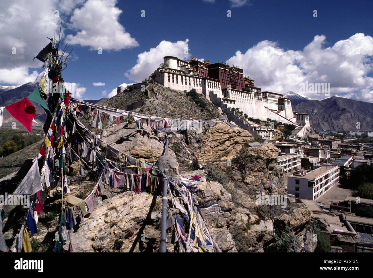 The Potala Palace with Tibetan Buddhist prayer flags Lhasa Tibet Stock ...