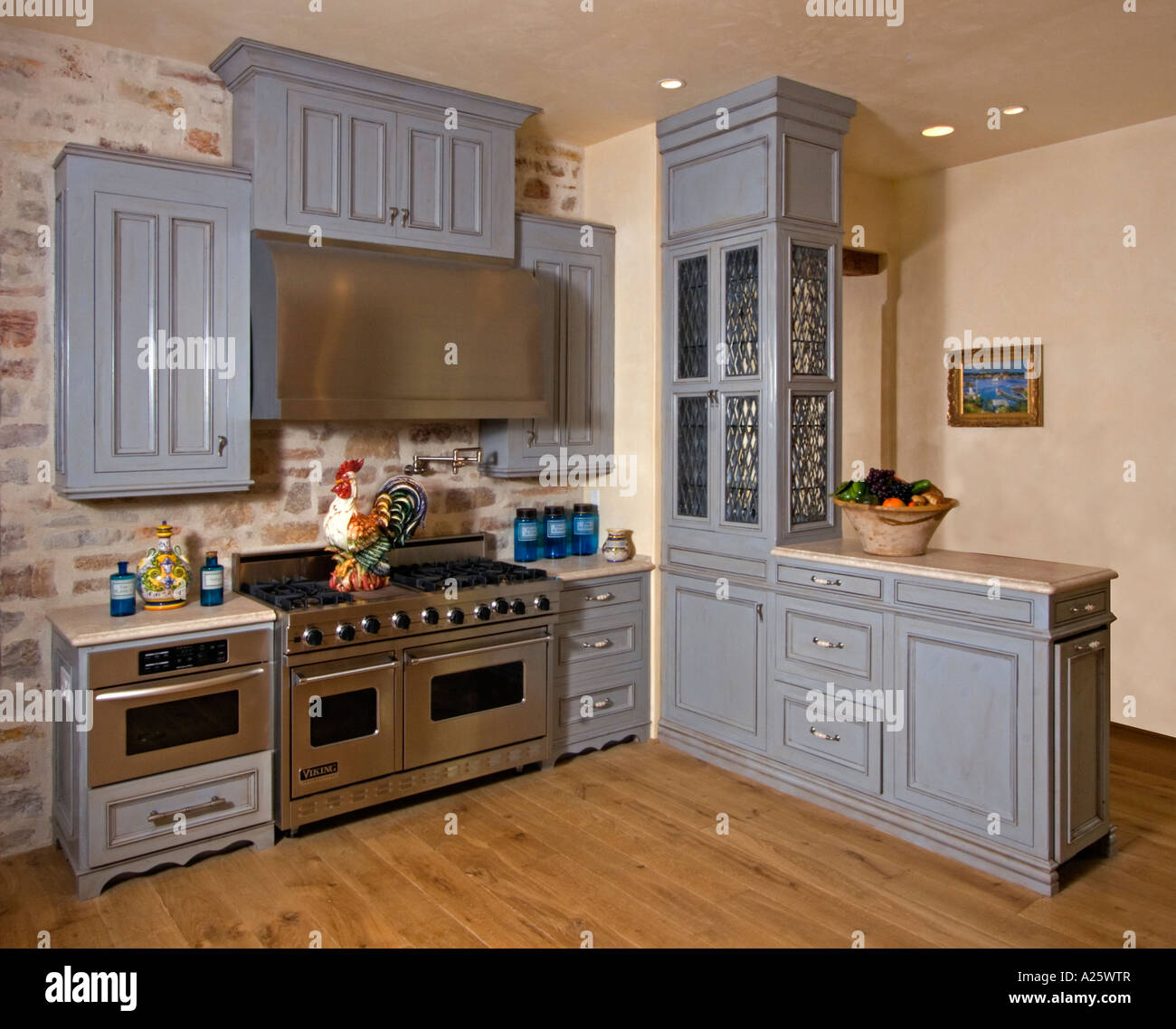 KITCHEN with cabinets oven stove sink and central counter CALIFORNIA ...