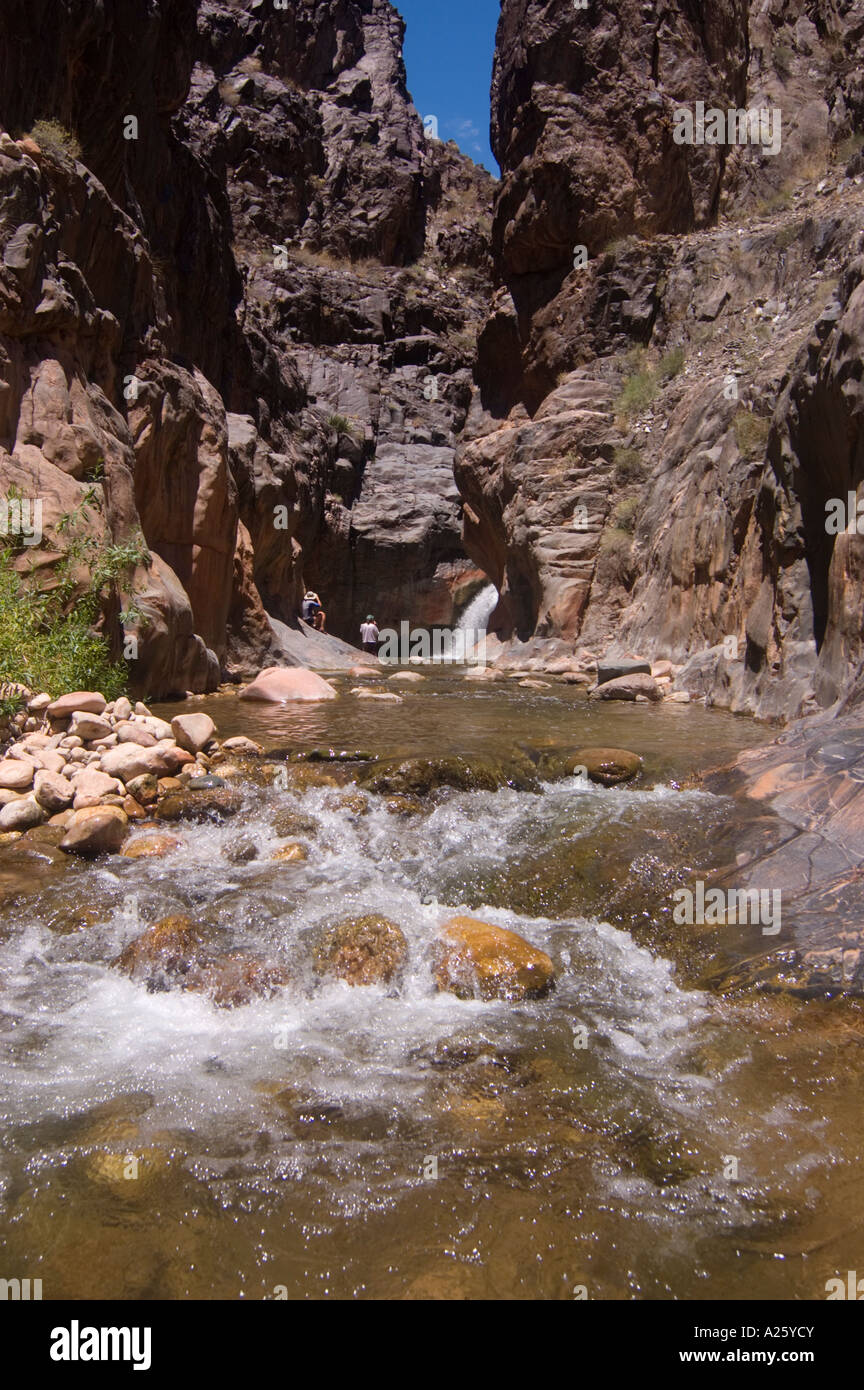 Hikers enjoy the waterfall at SHINOMU CREEK at mile 108 along the ...