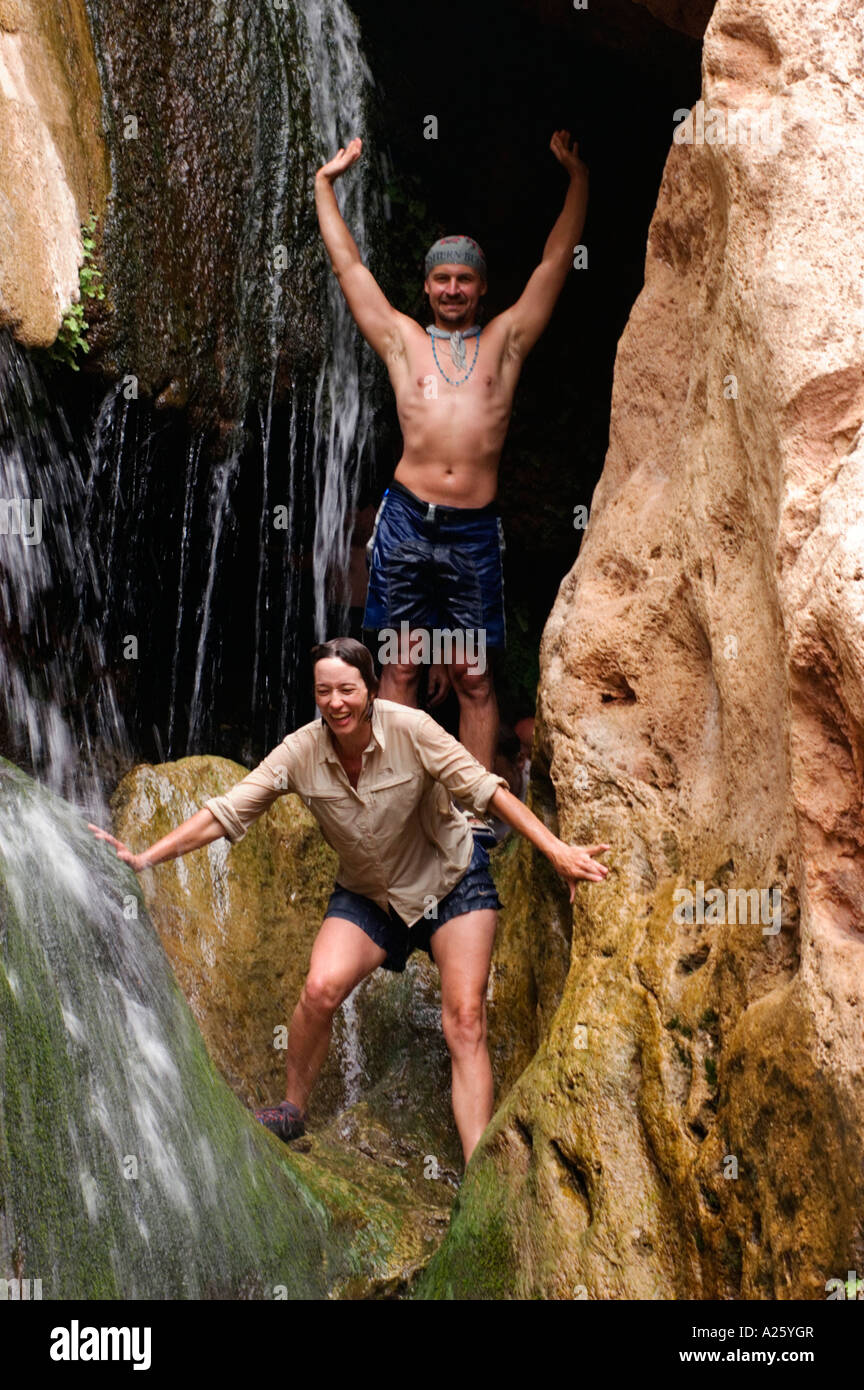 Hikers swim in ROYAL ARCH CREEK at ELVES CHASM a magical waterfall at ...
