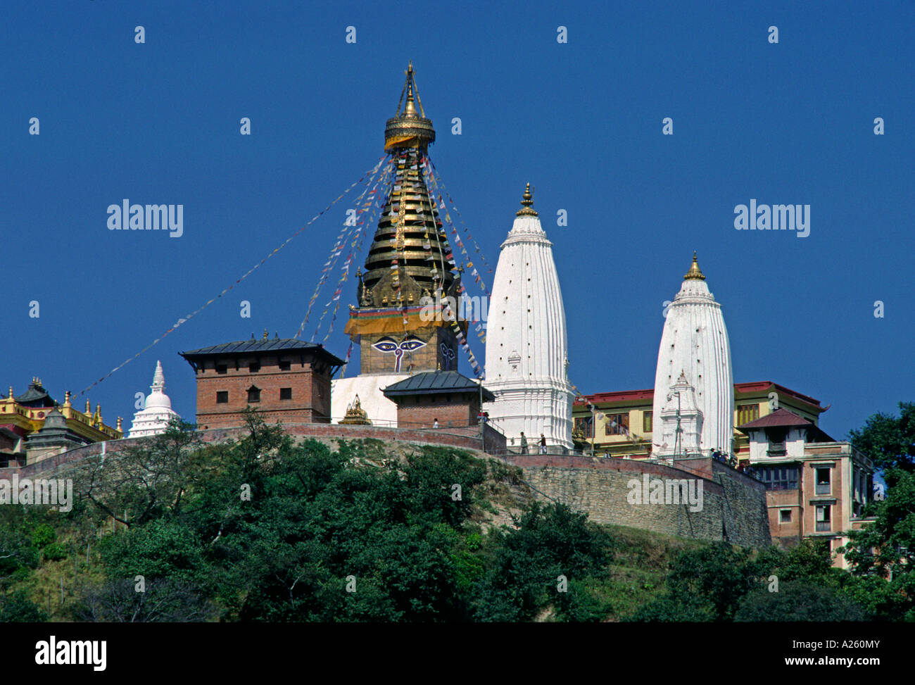 Sitting atop a hill in the Kathamndu Valley is the ancient SWAYAMBUNATH ...
