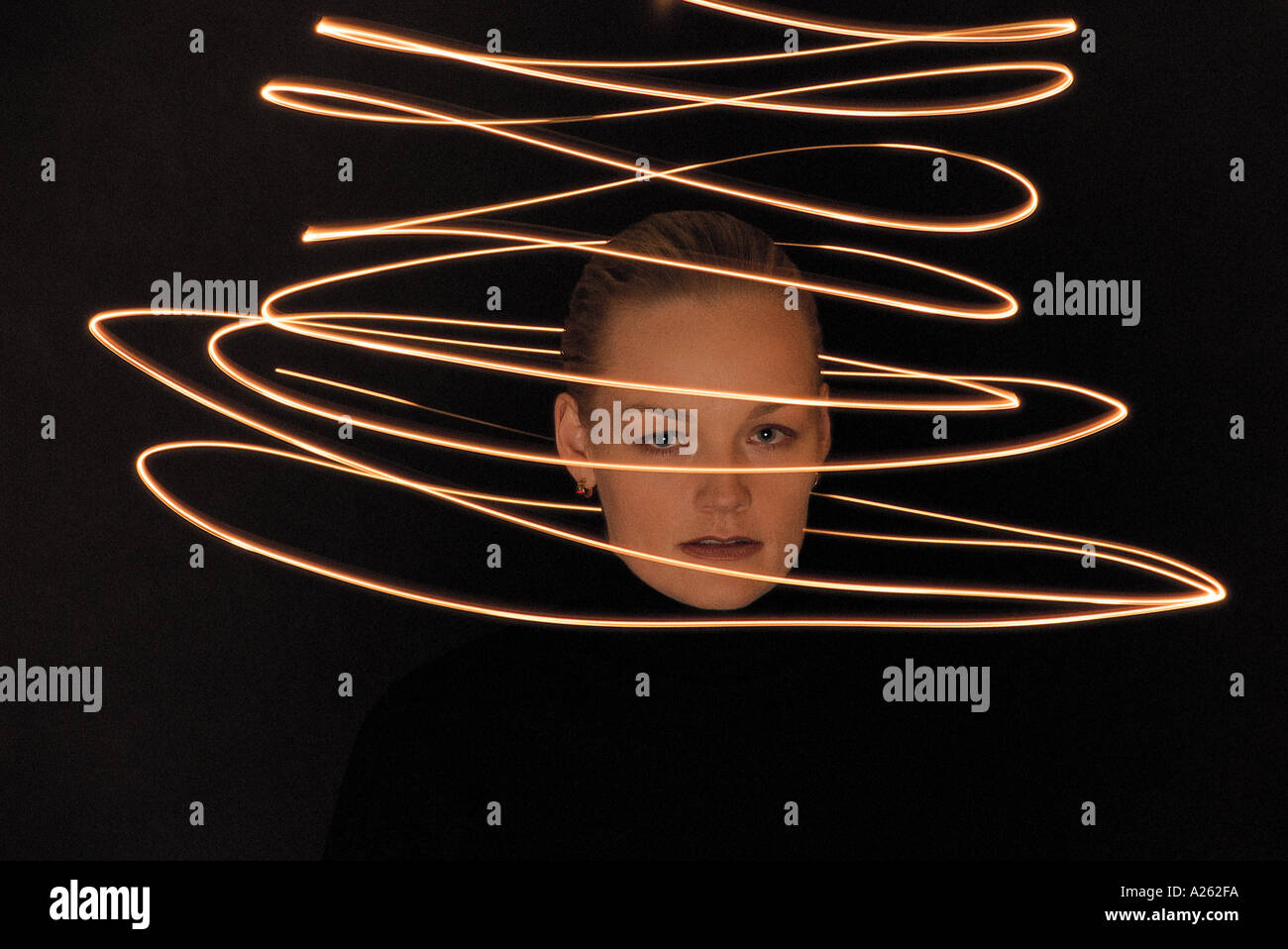 Womans head surrounded hi-res stock photography and images - Alamy