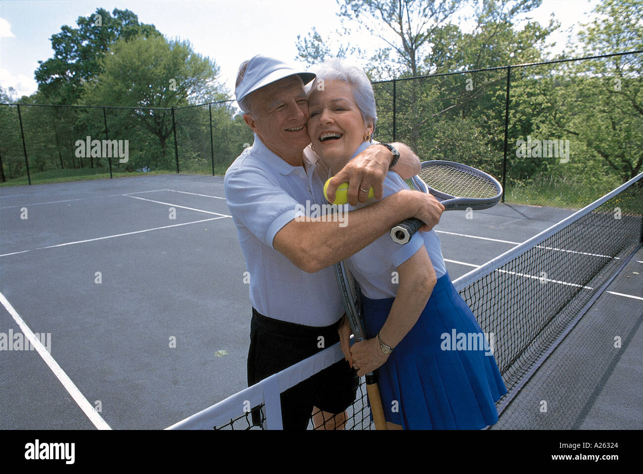 Female tennis player hugging tennis hi-res stock photography and images ...