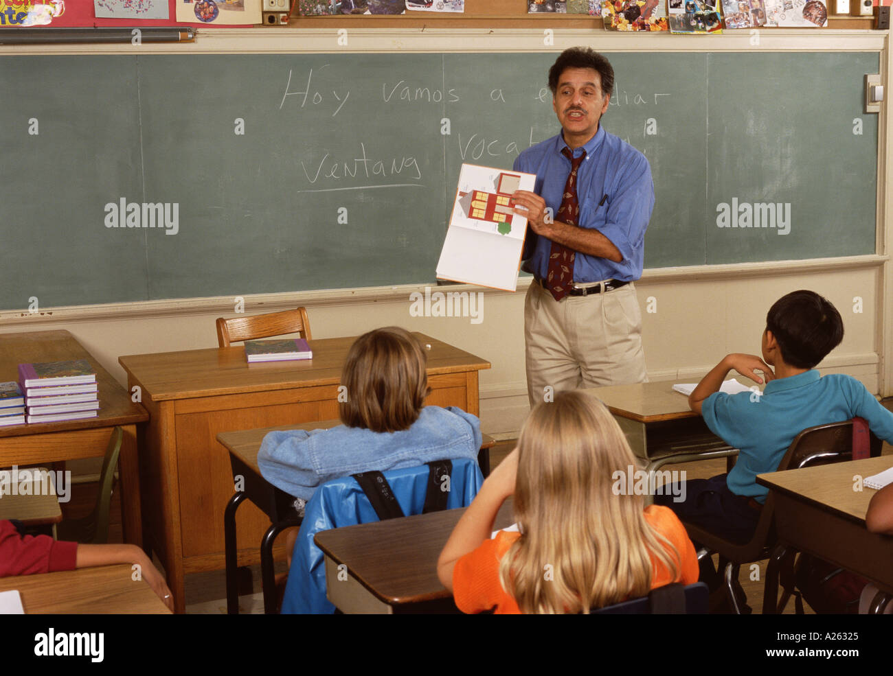 TEACHER WITH CLASS OF PRIMARY SCHOOL CHILDREN Stock Photo - Alamy