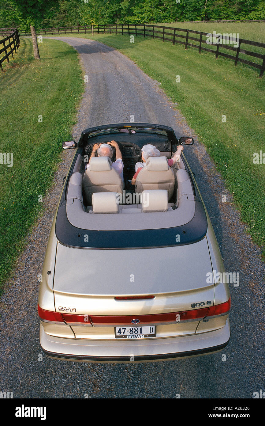 COUPLE IN CONVERTIBLE CAR Stock Photo - Alamy