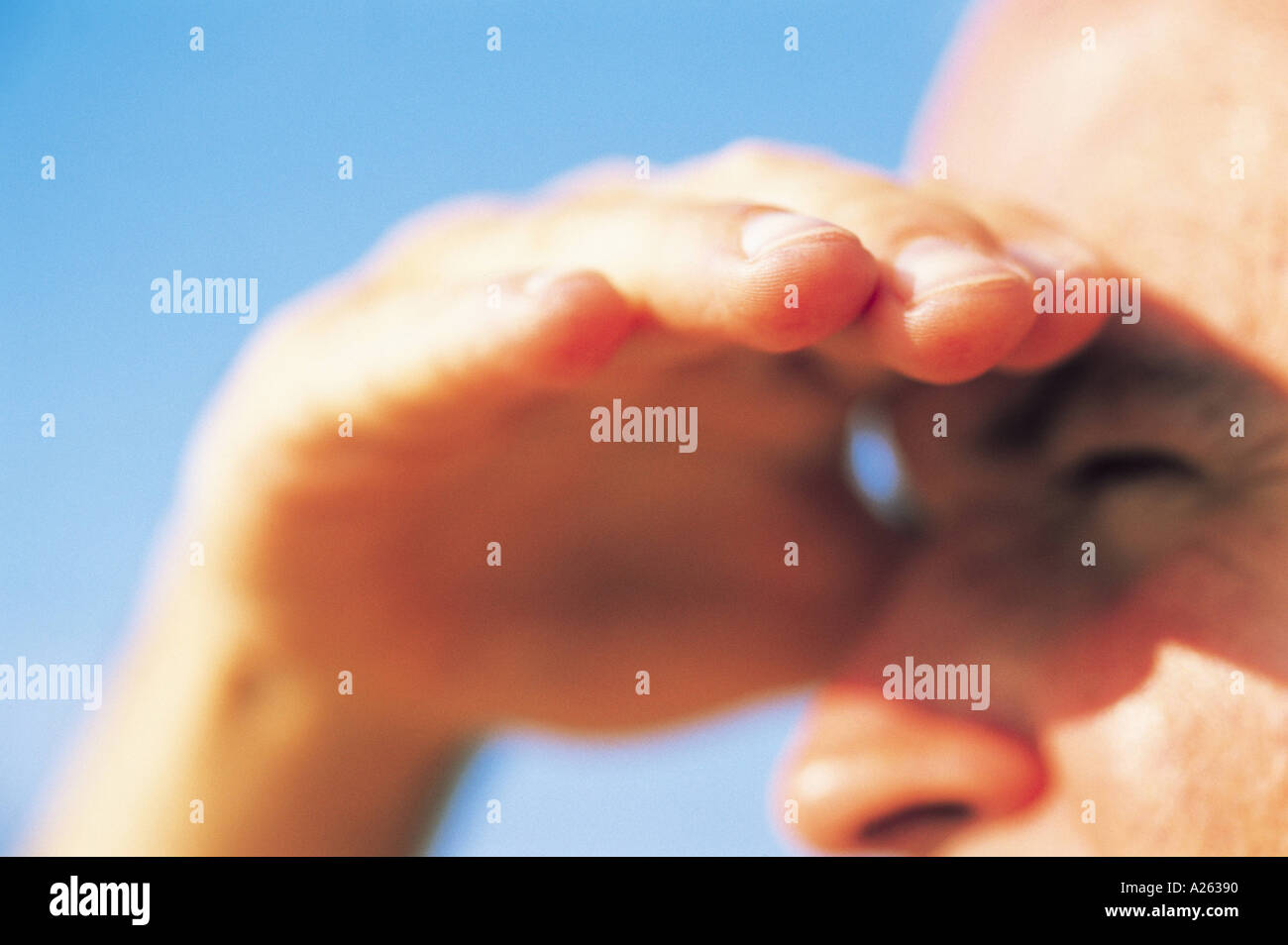 Sun shielding hands hi-res stock photography and images - Alamy