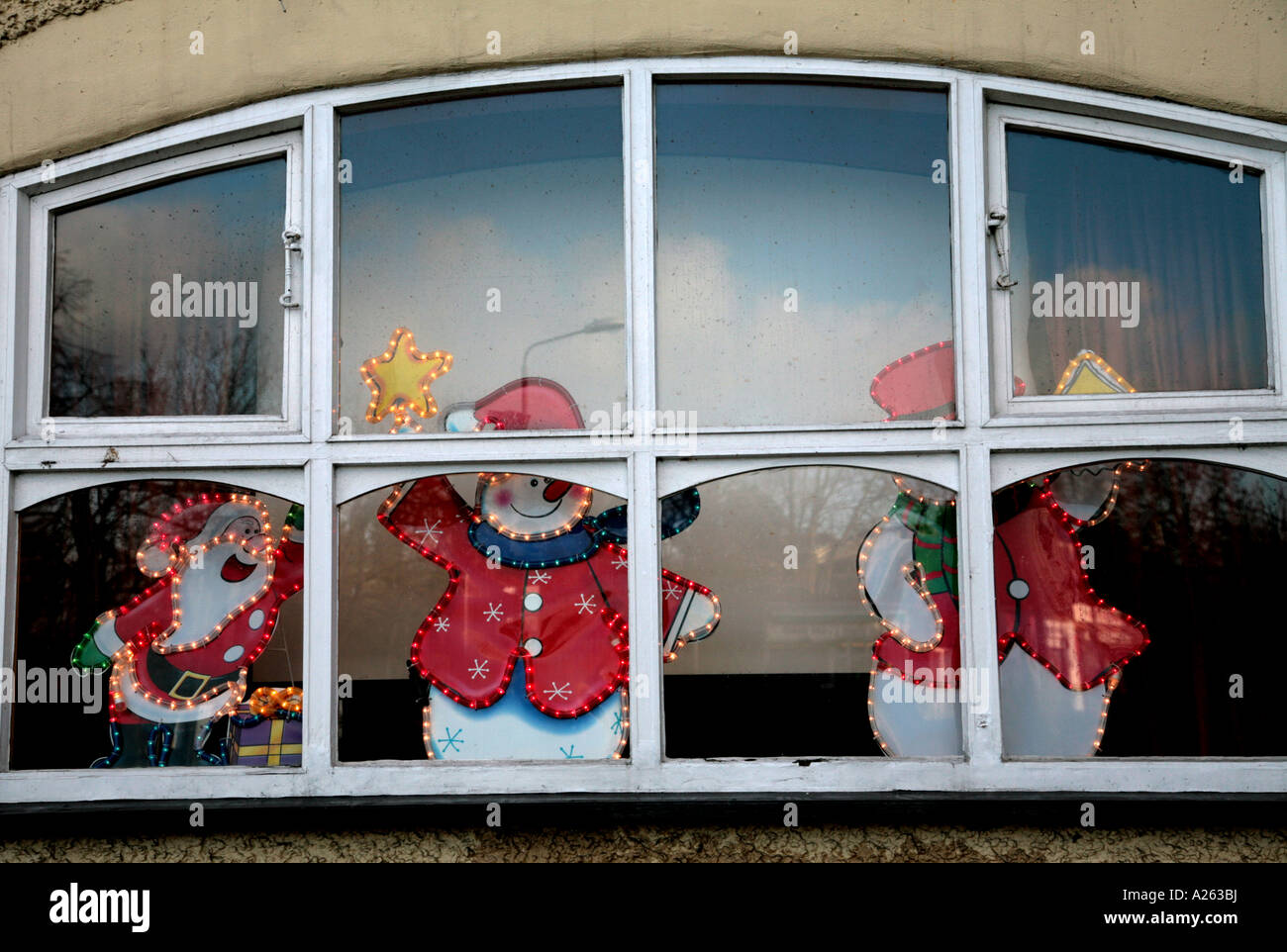 Christmas display in pub window Stock Photo - Alamy