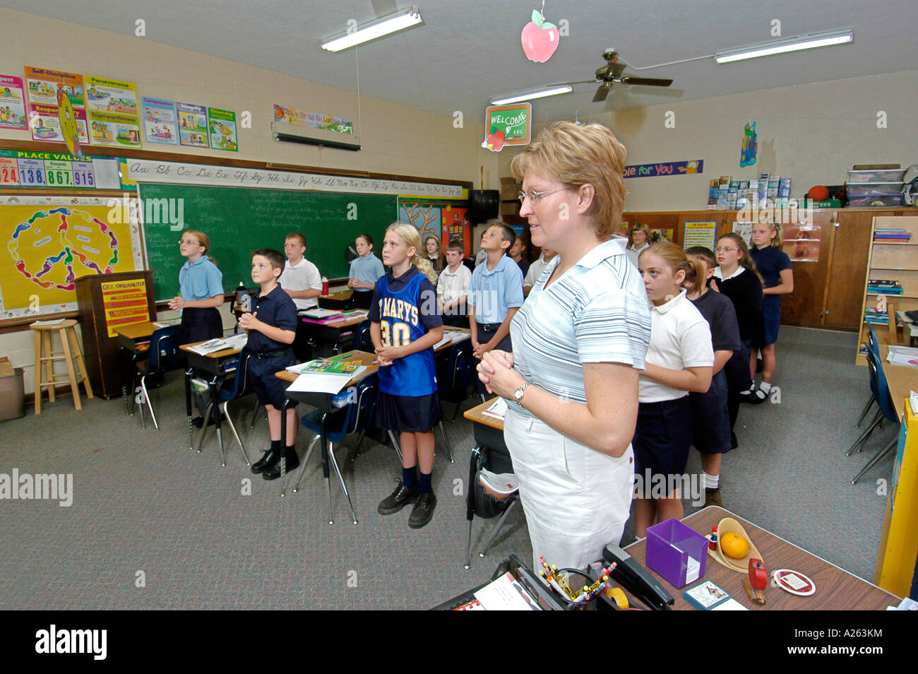 Daily classroom prayer Stock Photo - Alamy