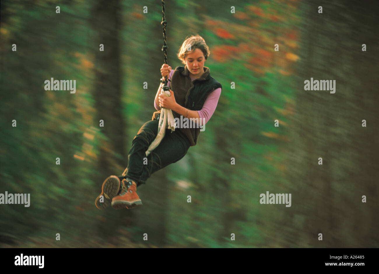 Boy swings on rope in hi-res stock photography and images - Alamy