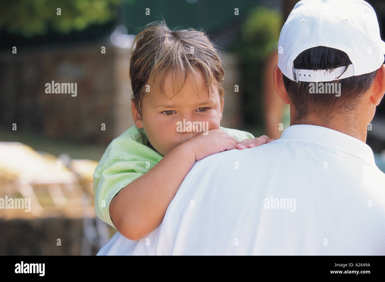 Father carrying son over shoulder hi-res stock photography and images ...