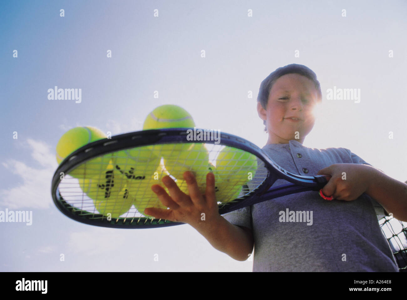 Balancing the ball with racket hi-res stock photography and images - Alamy