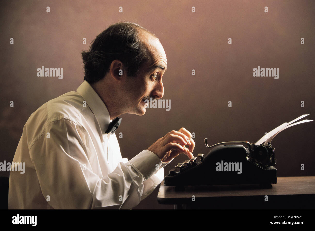 Men using typewriters hi-res stock photography and images - Alamy