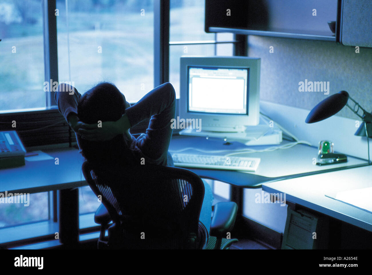 Woman sitting front computer hi-res stock photography and images - Alamy