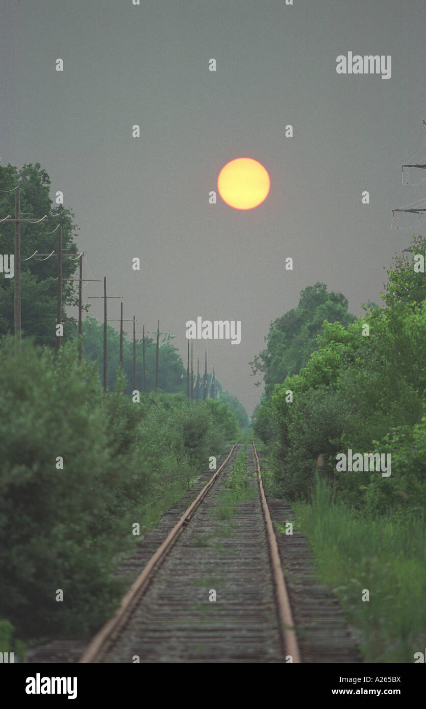 sunset over railroad tracks Stock Photo - Alamy