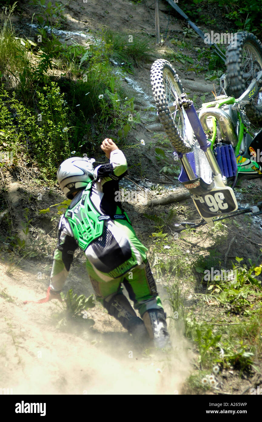 Contestants of all ages compete in a motorcycle hill climb race Stock ...