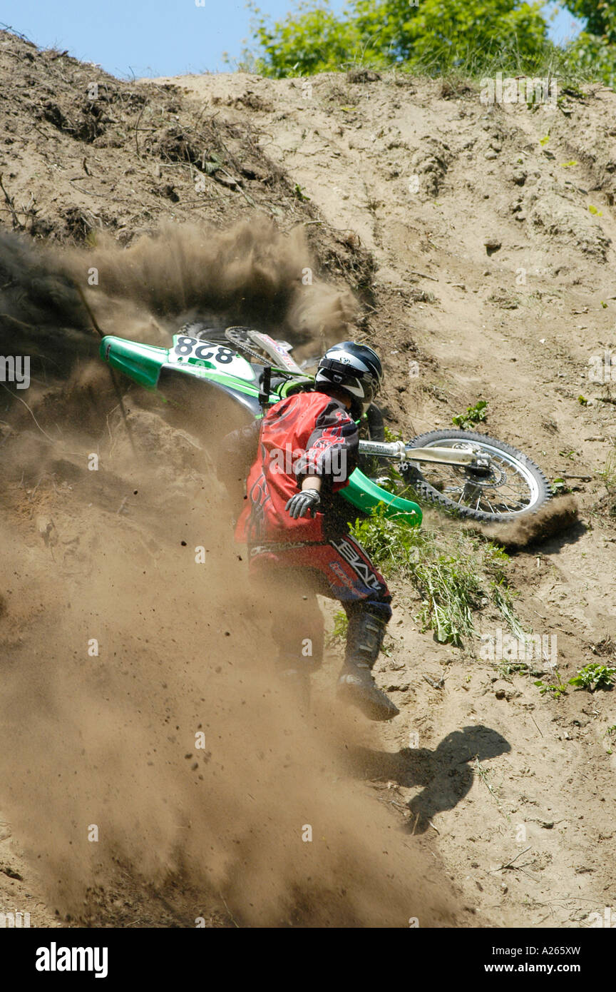Contestants of all ages compete in a motorcycle hill climb race Stock ...